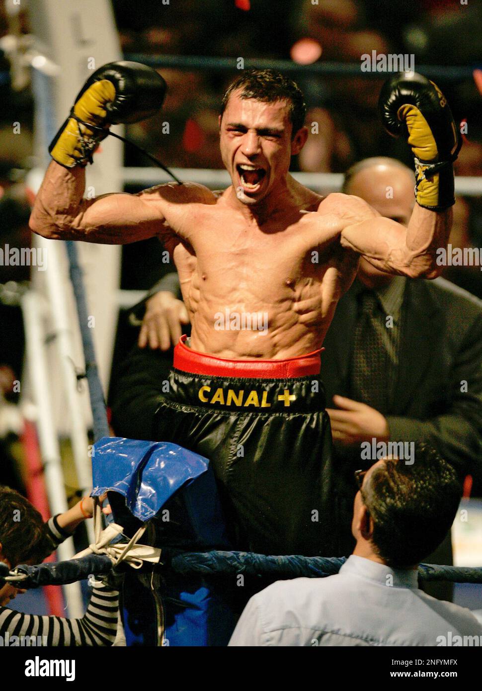 France's light flyweight boxer Brahim Asloum celebrates after winning ...