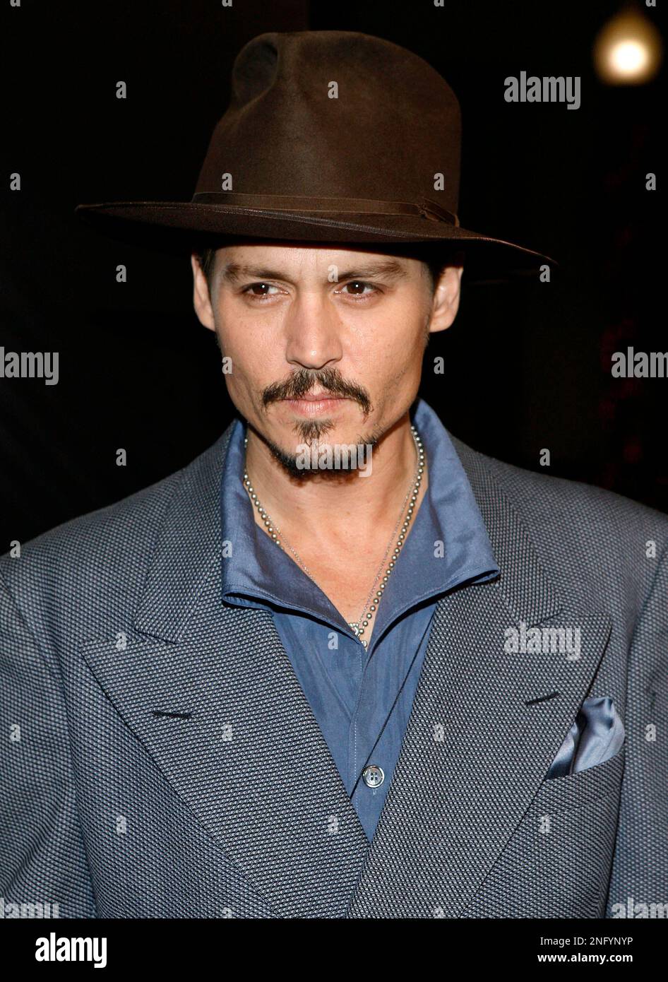 Actor Johnny Depp arrives at the premiere of "Sweeney Todd: The Demon ...