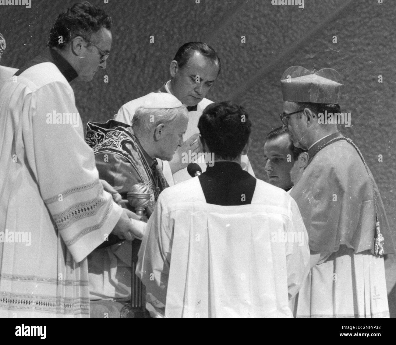Archbishop Joseph L. Bernardin, of Chicago, receives the Biretta from ...
