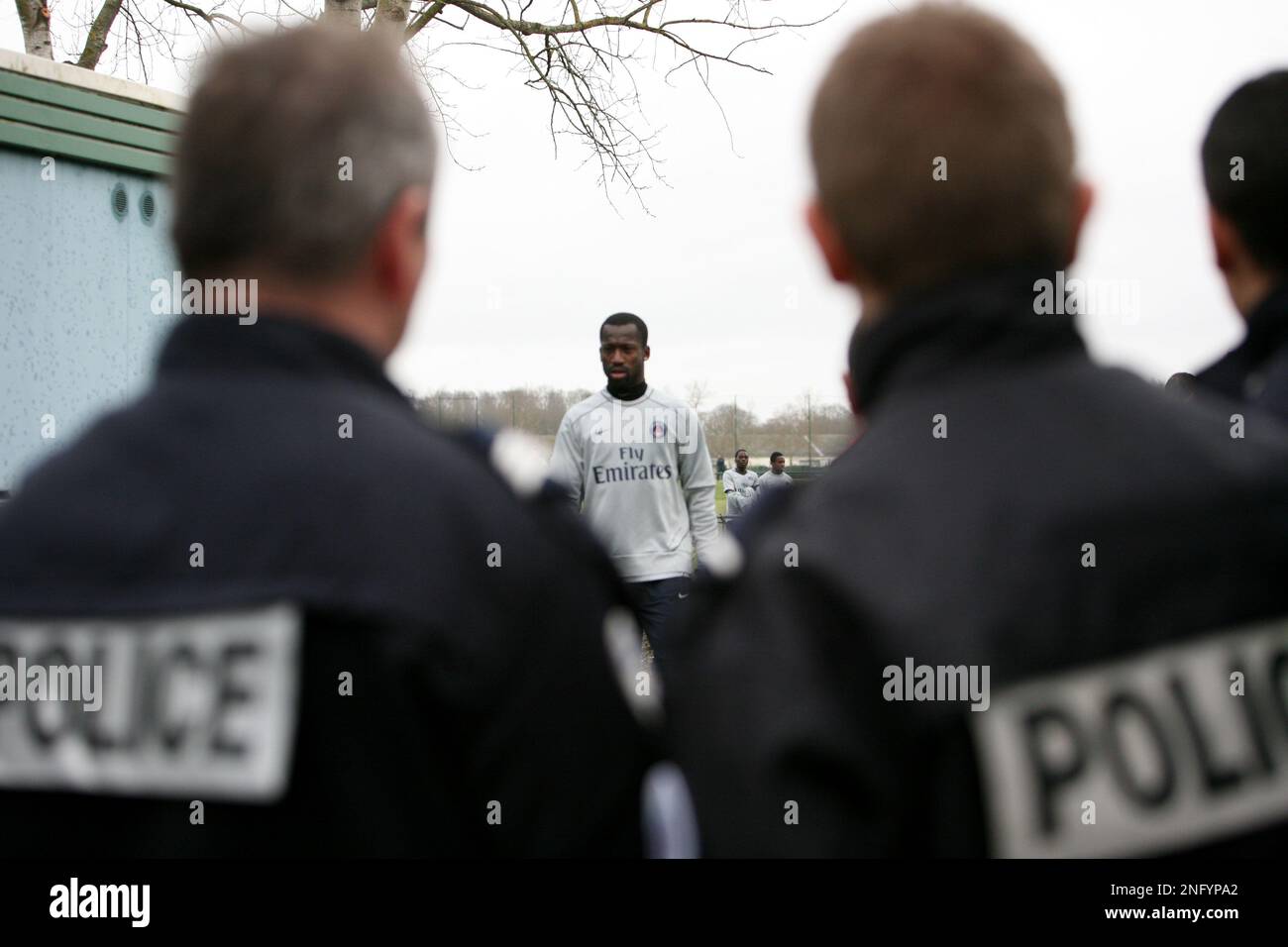 Police officers guard the Paris Saint Germain (PSG) soccer team ...