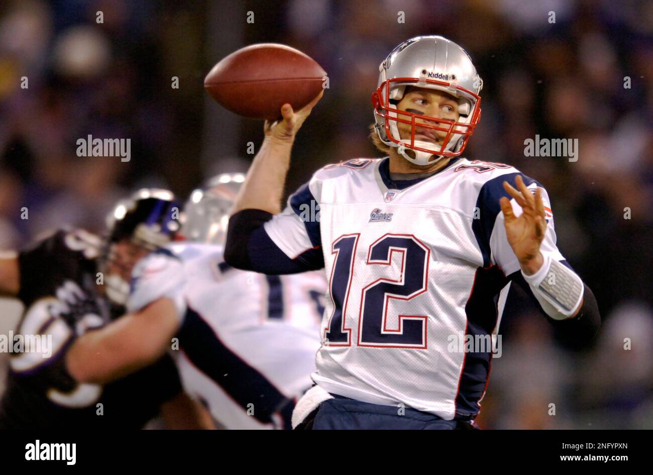 New England Patriots Tom Brady throws a pass against the Baltimore ...