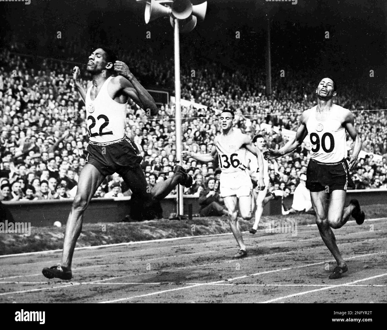 Arthur Wint of Jamaica, left, is seen winning the men's Olympic Games ...