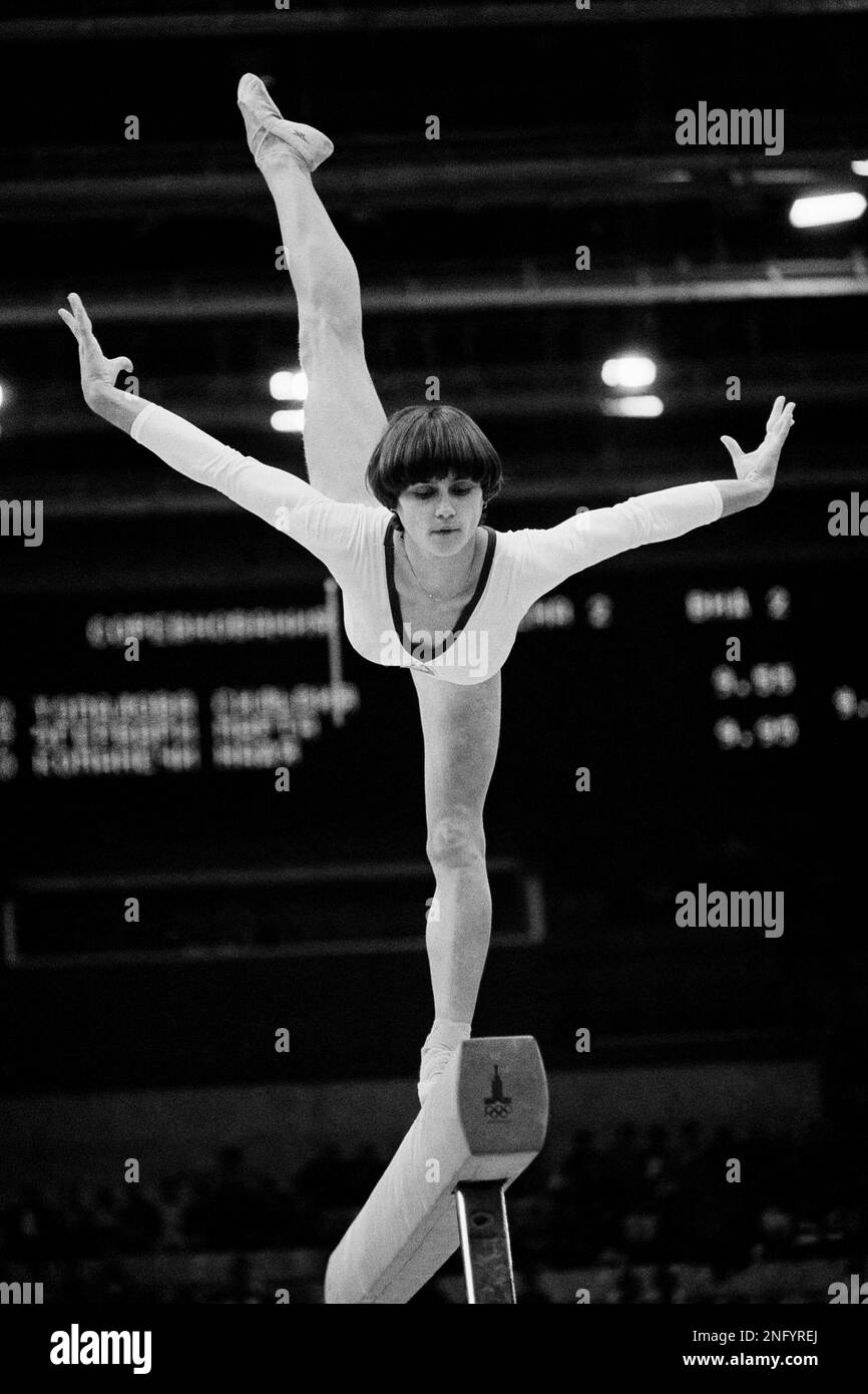 Nadia Comaneci of Romania performs on the balance bar during the Women ...