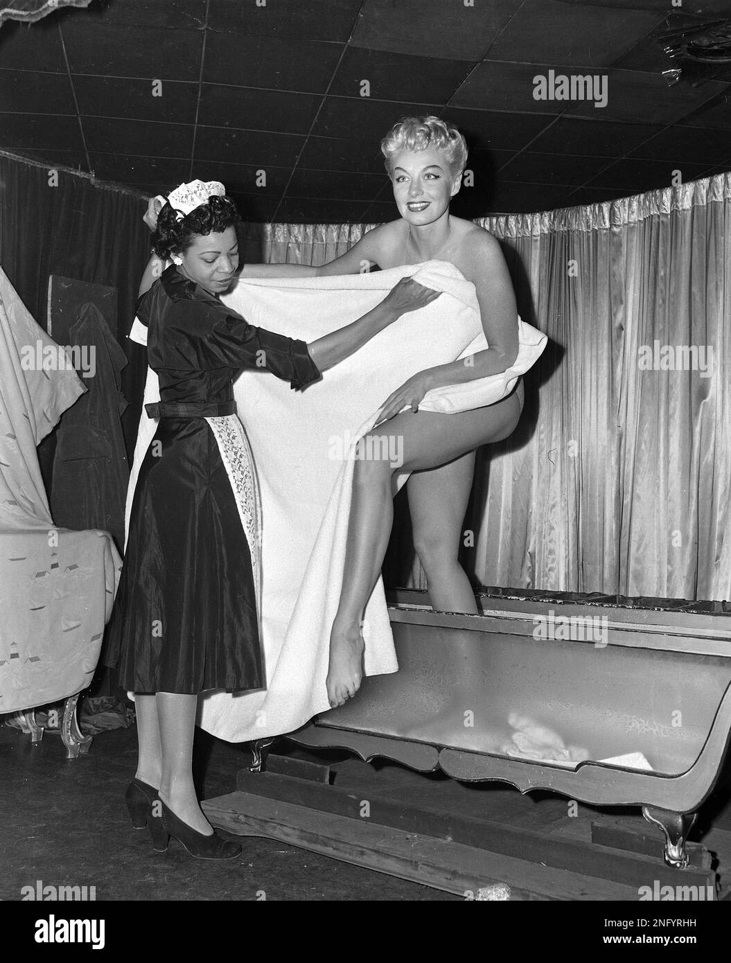 Striptease Artist Lili St Cyr Is Seen As She Emerges From Her Bubble