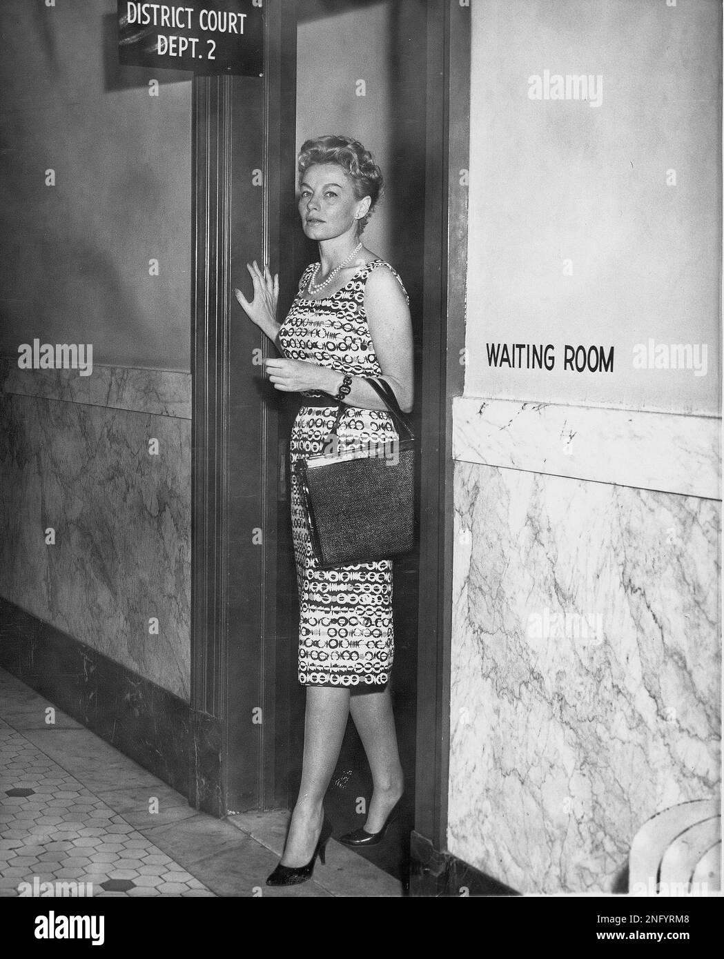 Striptease artist Lili St. Cyr leaves a Reno, Nev., courtroom after ...