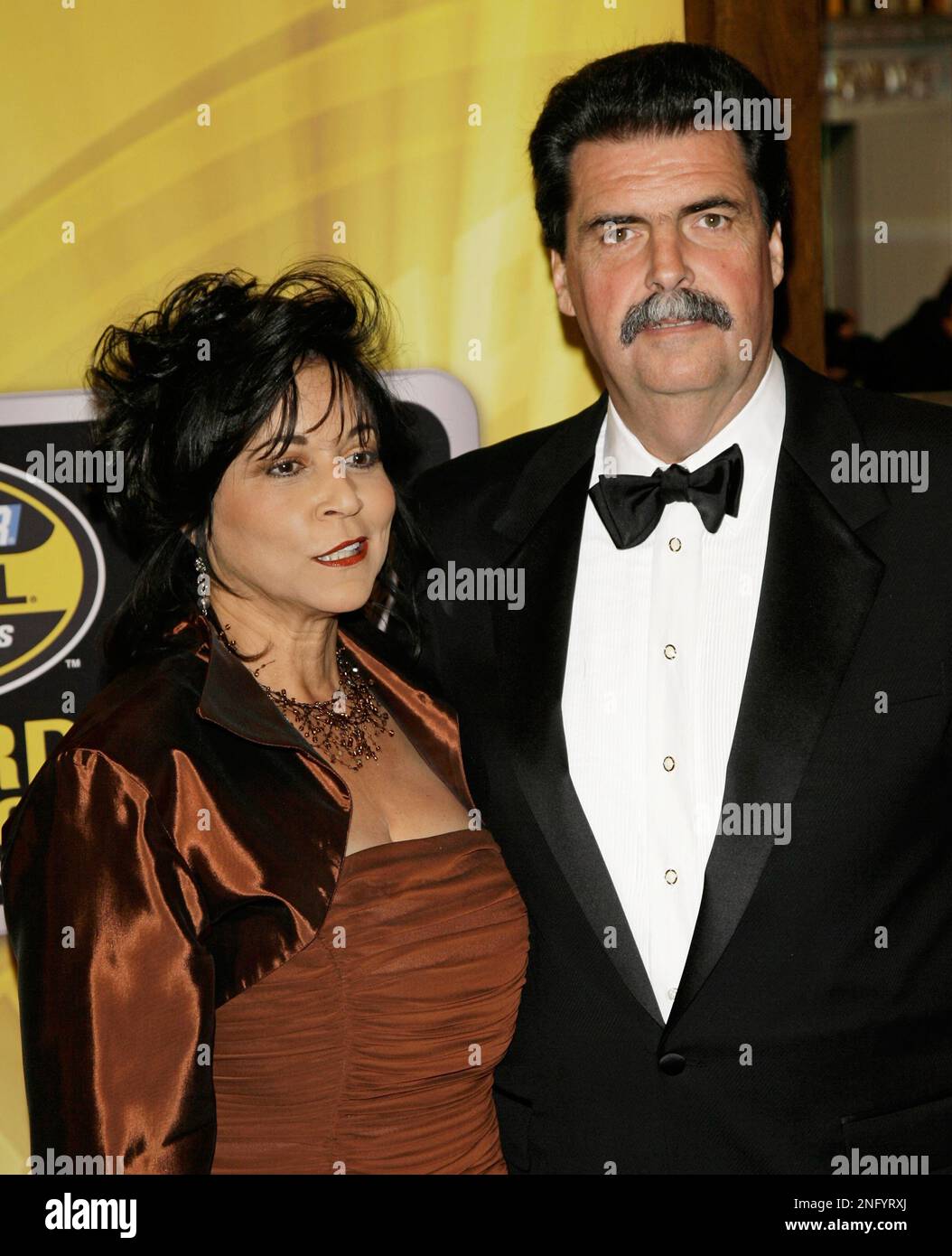 NASCAR President Mike Helton and his wife Lynda Helton arrive for the ...