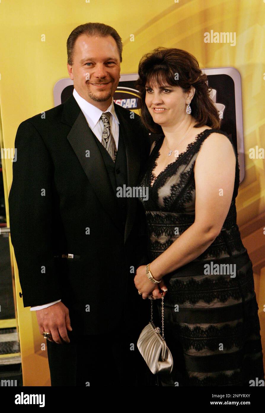 Driver Mike David and an unidentified guest arrive for the NASCAR ...