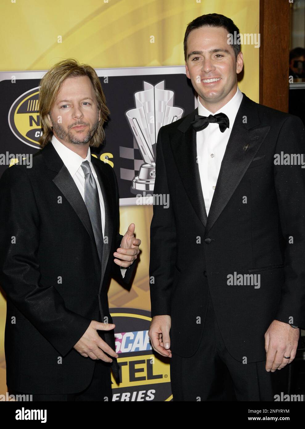 Jimmie Johnson, right, NASCAR Nextel Cup Series champion, poses with ...