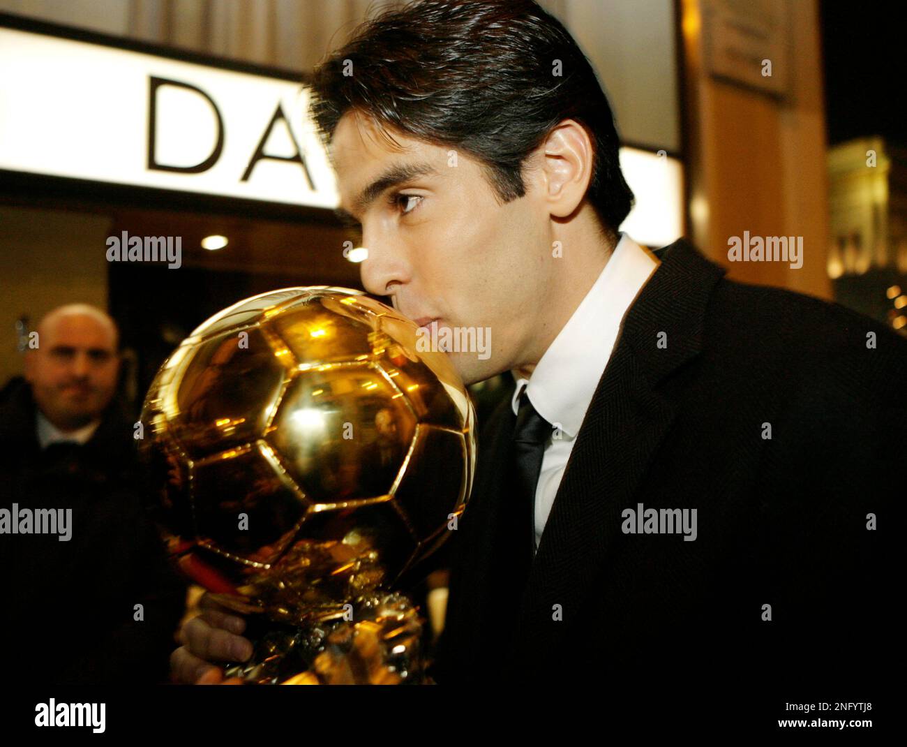 AC Milan Brazilian midfielder Ricardo Kaka kisses the Golden Ball as he ...