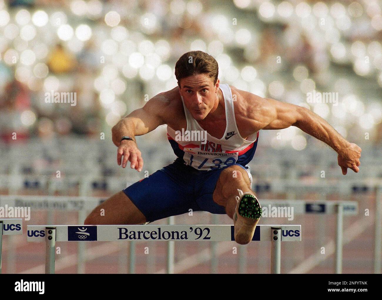 Robert Muzzio of Lake Ridge, VA. runs the 110 meter decathlon hurdles ...