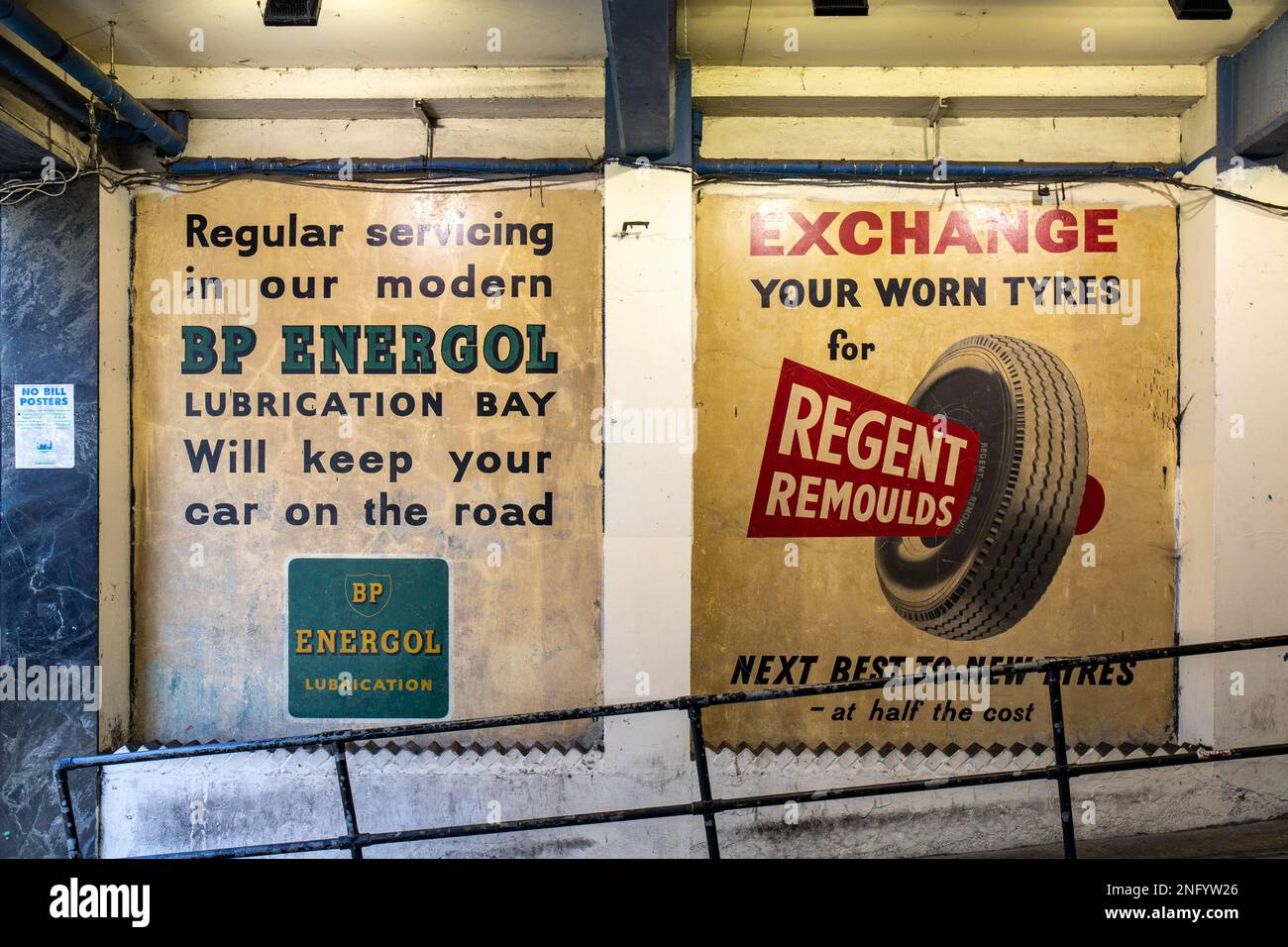 Restored ghost signs on Poland Street car park wall in Soho district of ...
