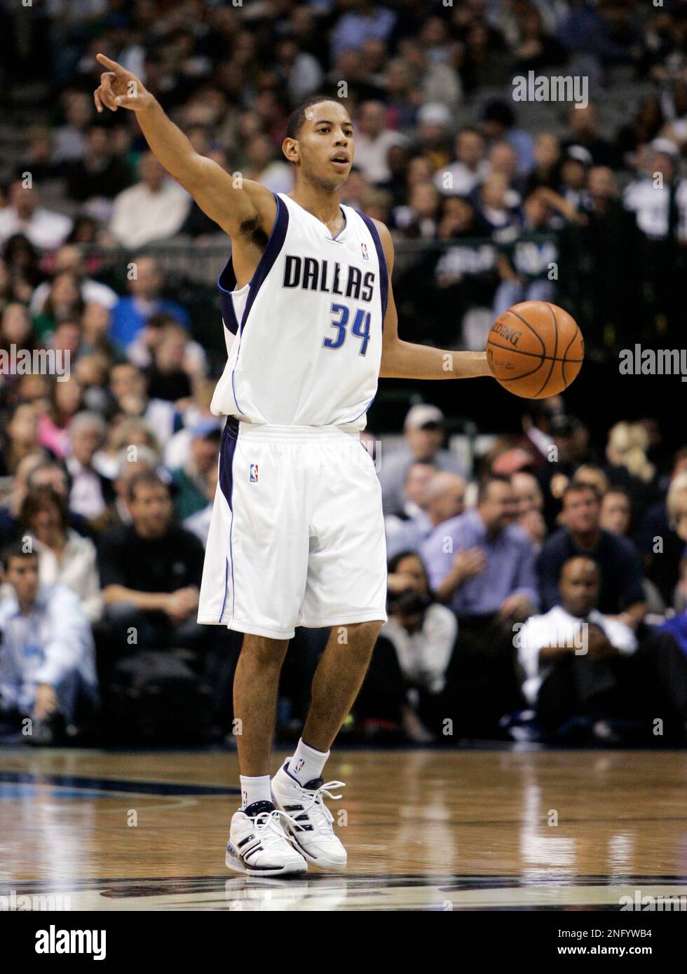 Dallas Mavericks guard Devin Harris (34) instructs his teammates as he ...