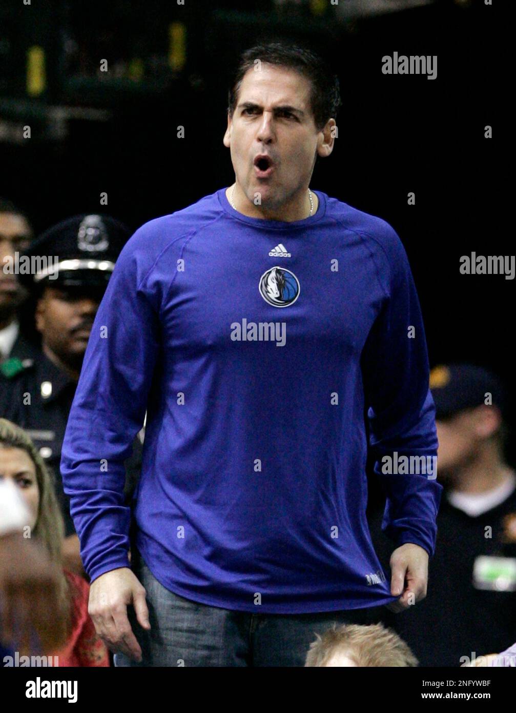 Dallas Mavericks team owner Mark Cuban reacts to play during a NBA ...