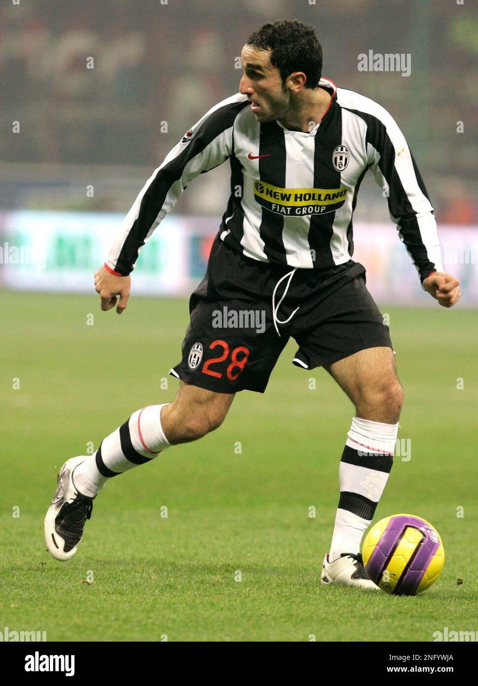 Juventus defender Cristian Molinaro controls the ball during the ...