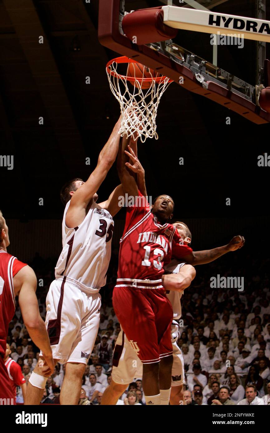 Indiana's Jamarcus Ellis (13) and Southern Illinois' Tony Boyle (35 ...