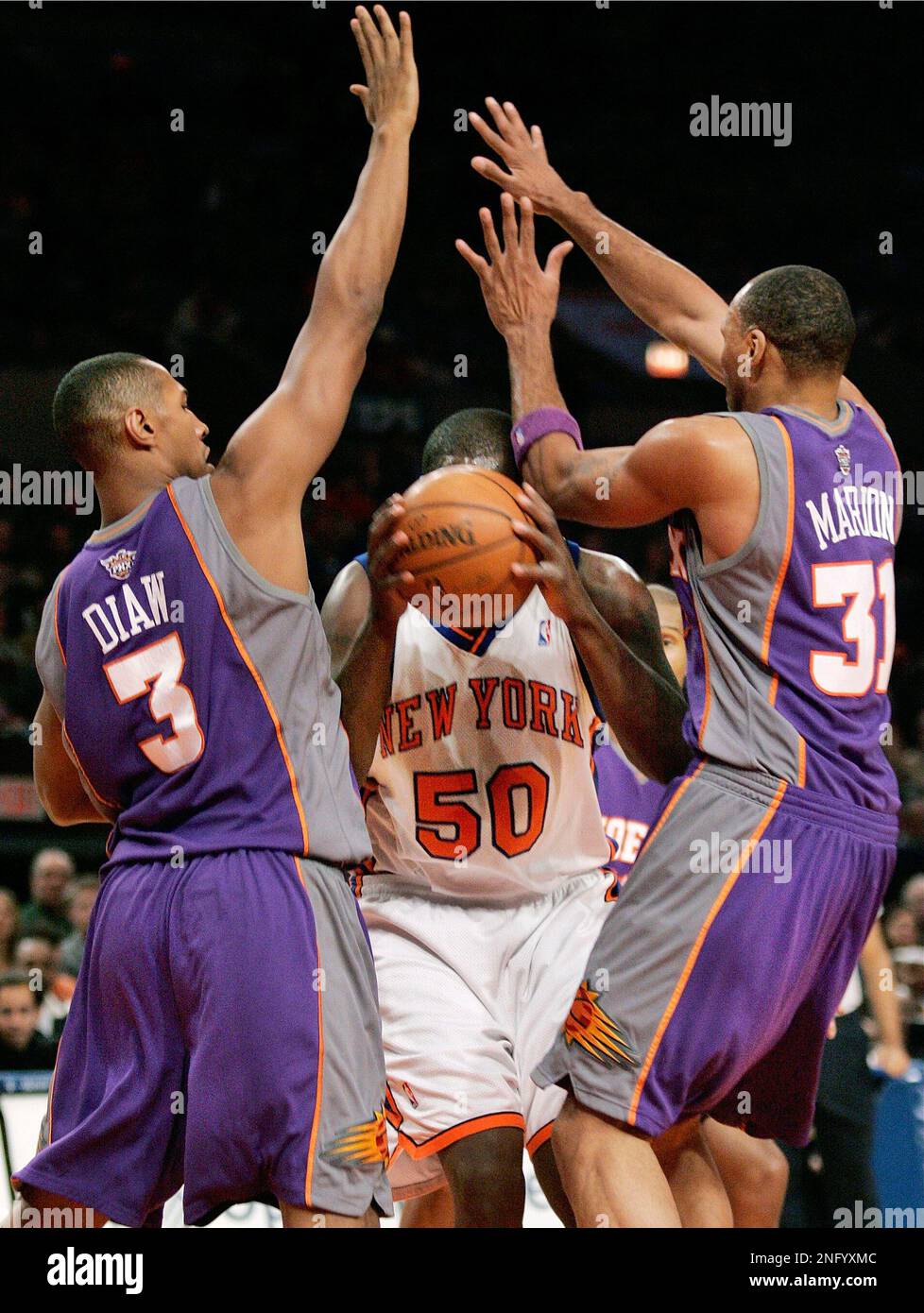 Phoenix Suns center Boris Diaw (3), of France, andforward Shawn Marion ...