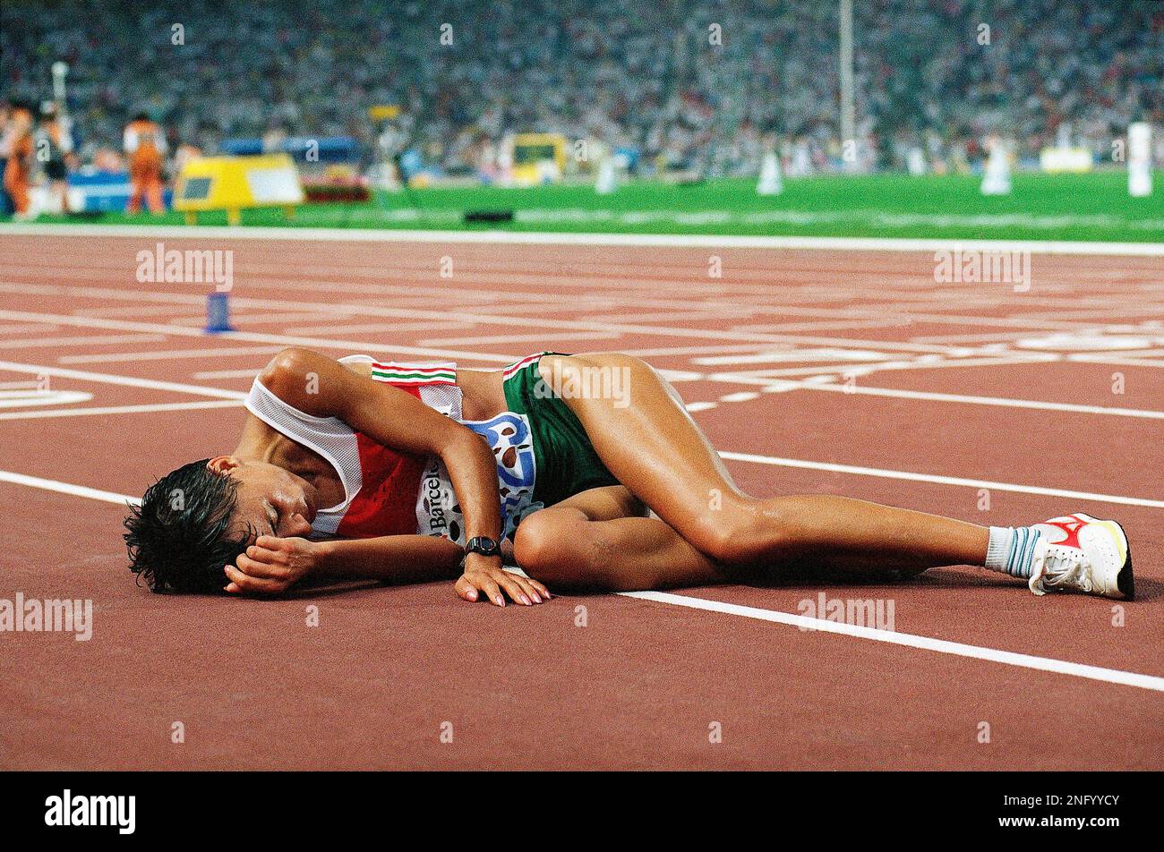 Hungarian Olympic marathon runner Karolina Szabo is seen collapsed on ...