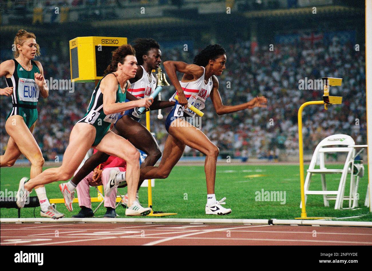 The Unified Team's Olge Bryzgina (centre) takes over from Olga Nazaroua ...