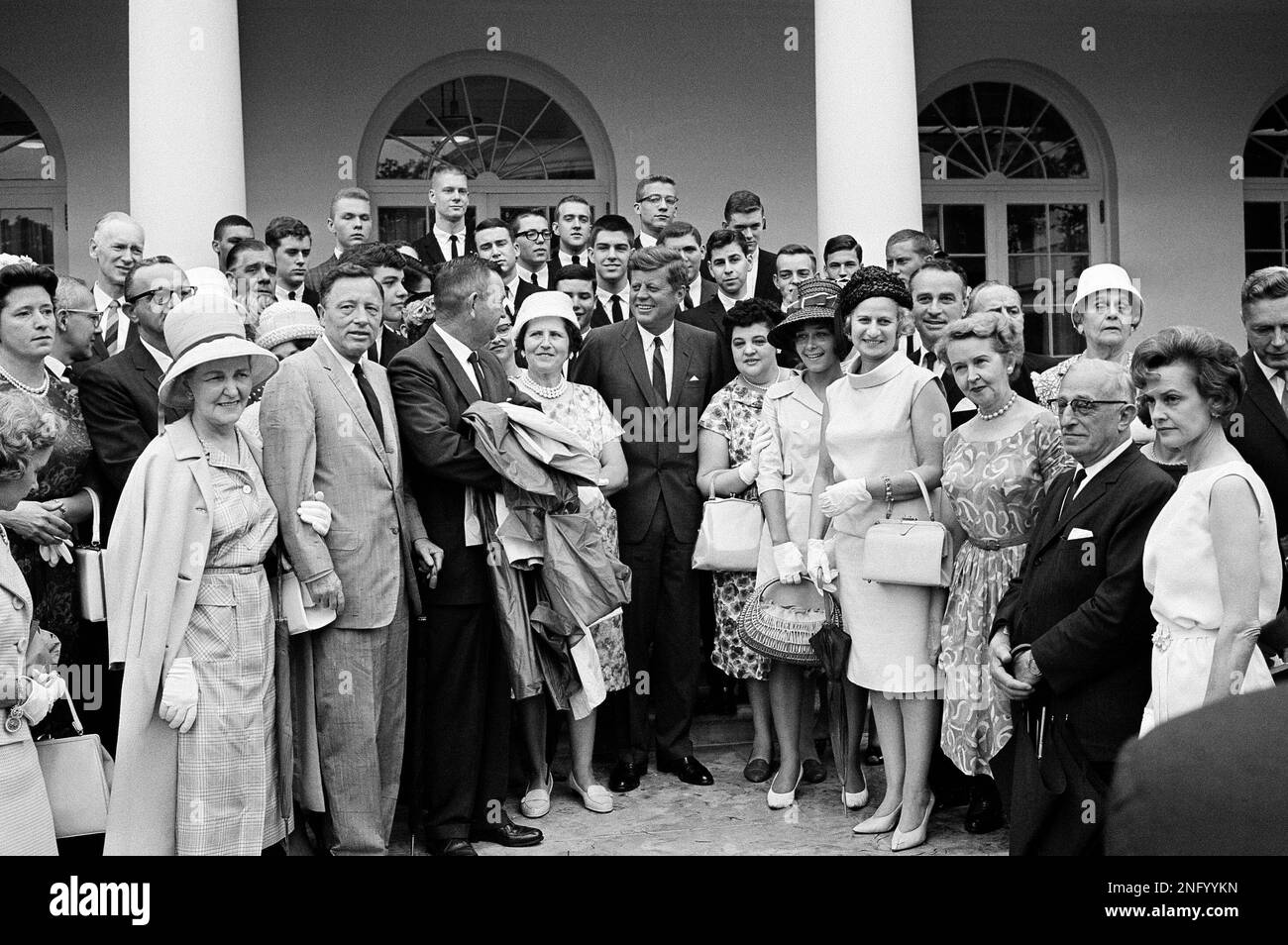President John Kennedy poses June 11, 1963 with graduates of the ...