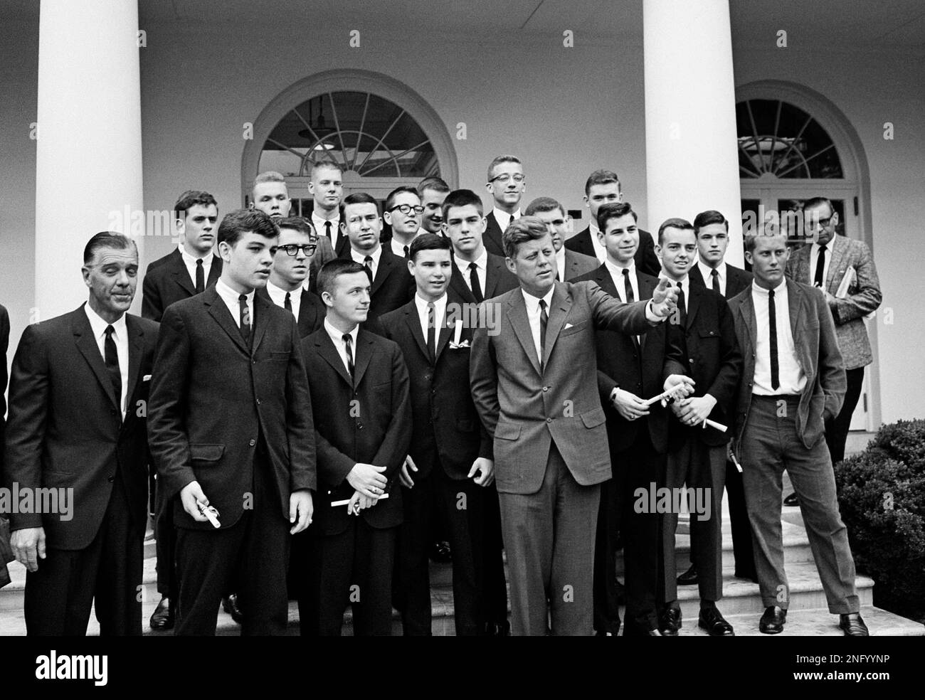 President John Kennedy poses June 11, 1963 with graduates of the ...