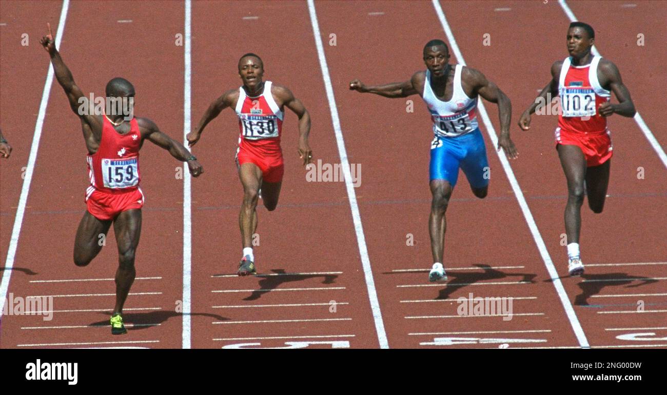 Canadian sprinter Ben Johnson, left, looks over at rival Carl Lewis at ...