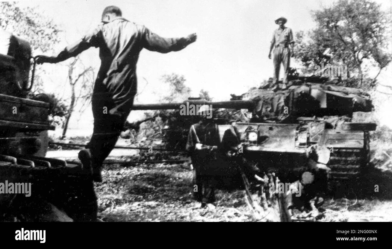 Pakistani soldiers examine, what they claim to be Indian Centurion ...