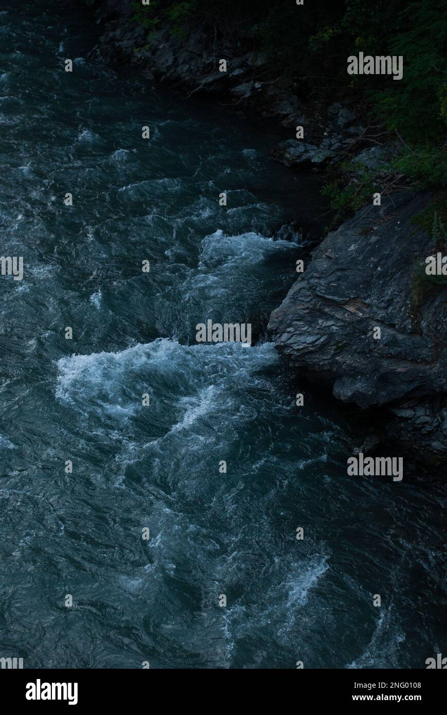 Mountain river with clear water near rock Stock Photo - Alamy