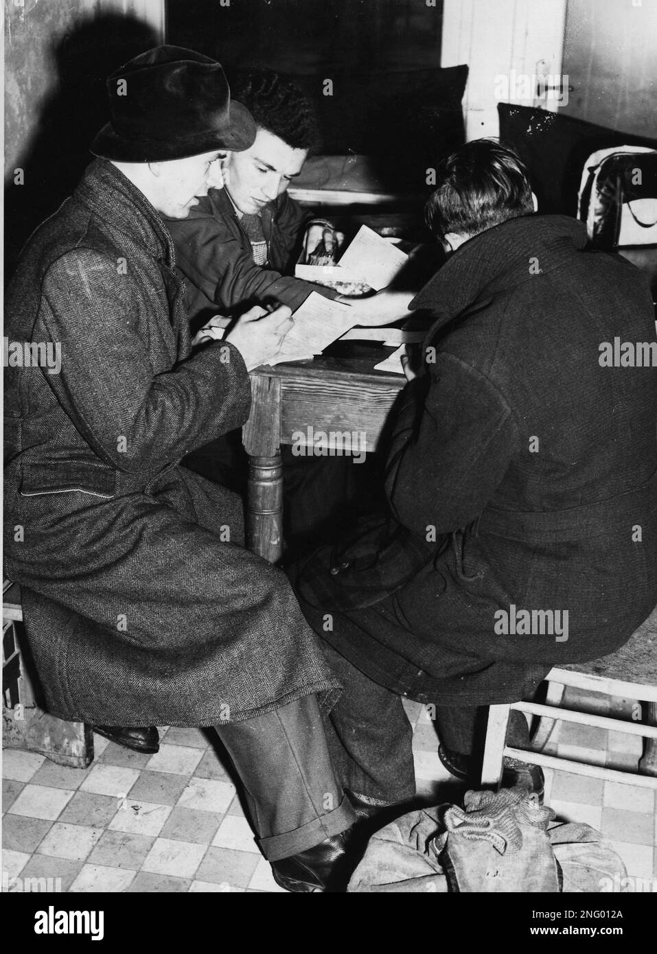 These former inmates receive a small sum of West Marks at the office of ...