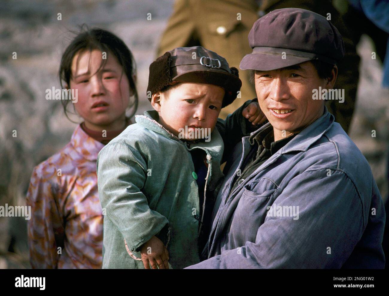 Seen here is an unidentified man with a child in Beijing, China, 1984 ...