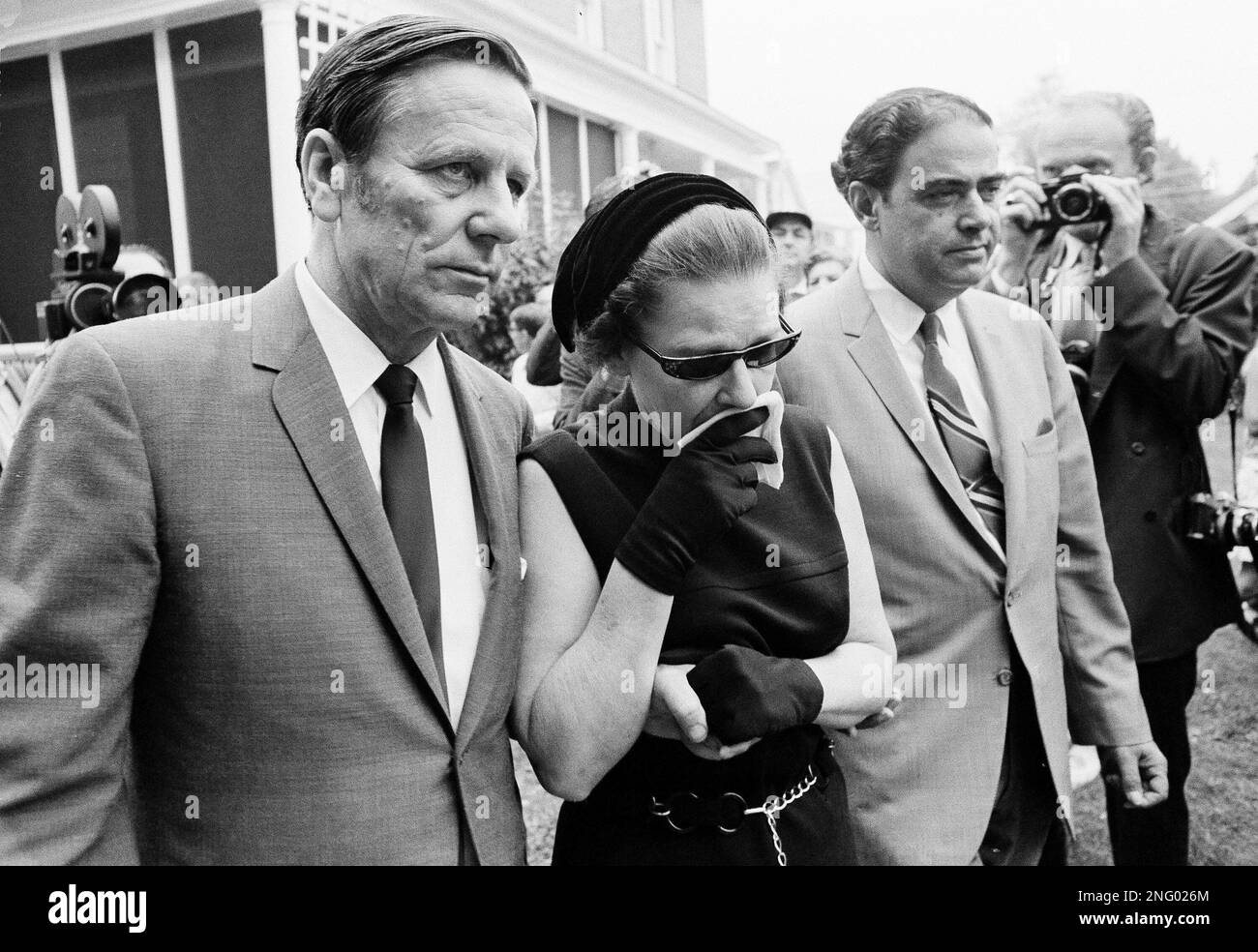 Joseph Kopechne of Berkley, N.J., supports his weeping wife Gwen as the ...