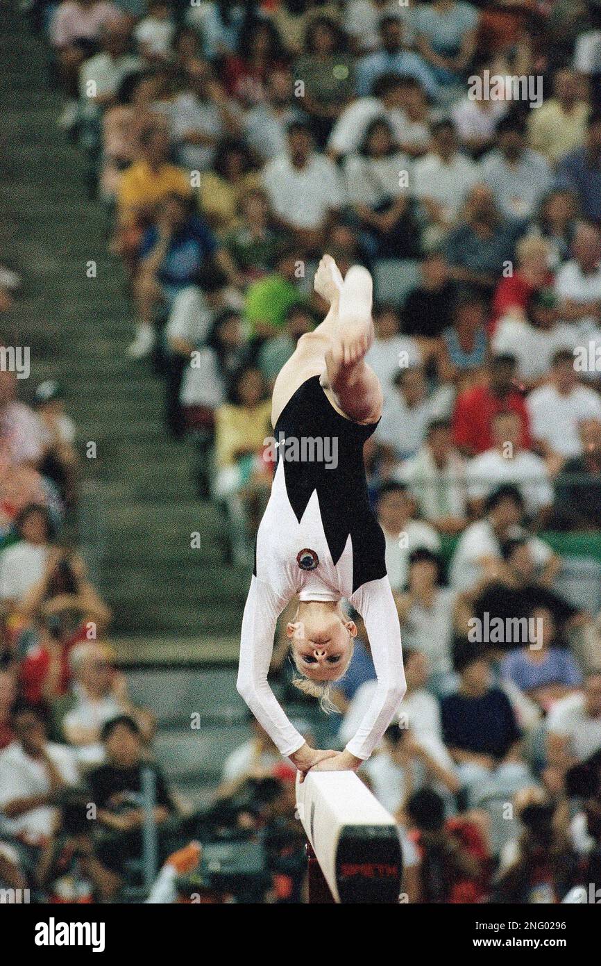 Tatiana Gutsu of the Unified Team goes through her paces on the beam on ...