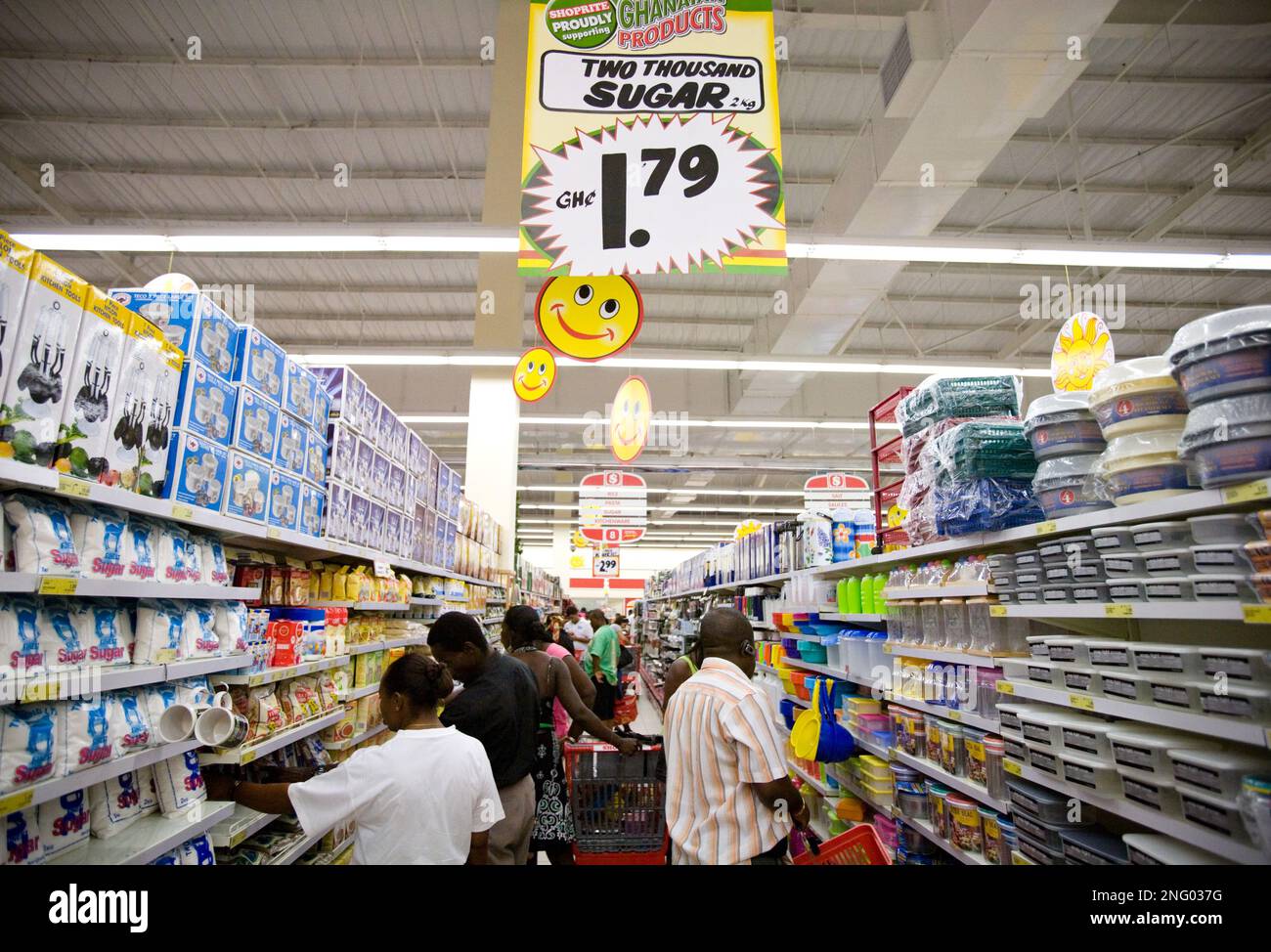 Customers shop at the Shoprite supermarket in the city's new shopping mall in Accra, Ghana on ...