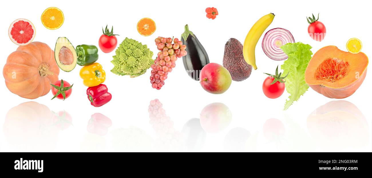 Soaring fresh bright vegetables and fruits with light reflection ...