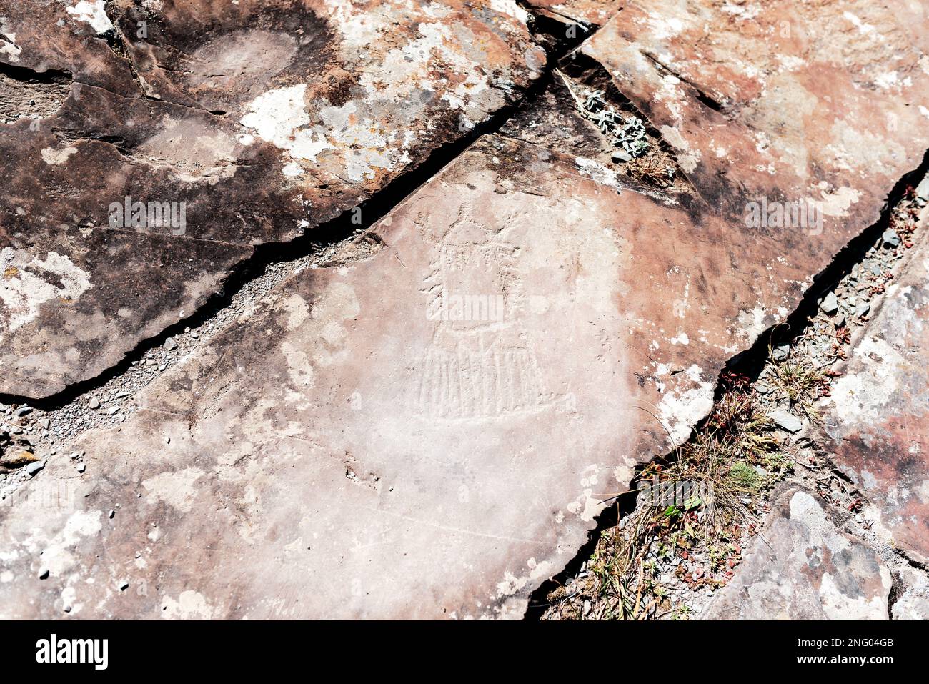 Petroglyphs rock drawings of ancient people of an unknown spaceship on ...