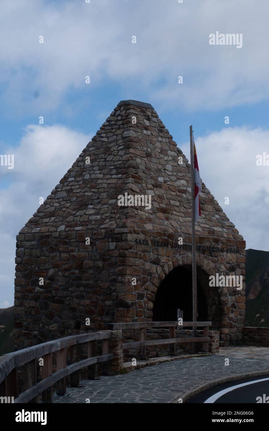 Mountains and buildings in summer sun light road hi-res stock ...