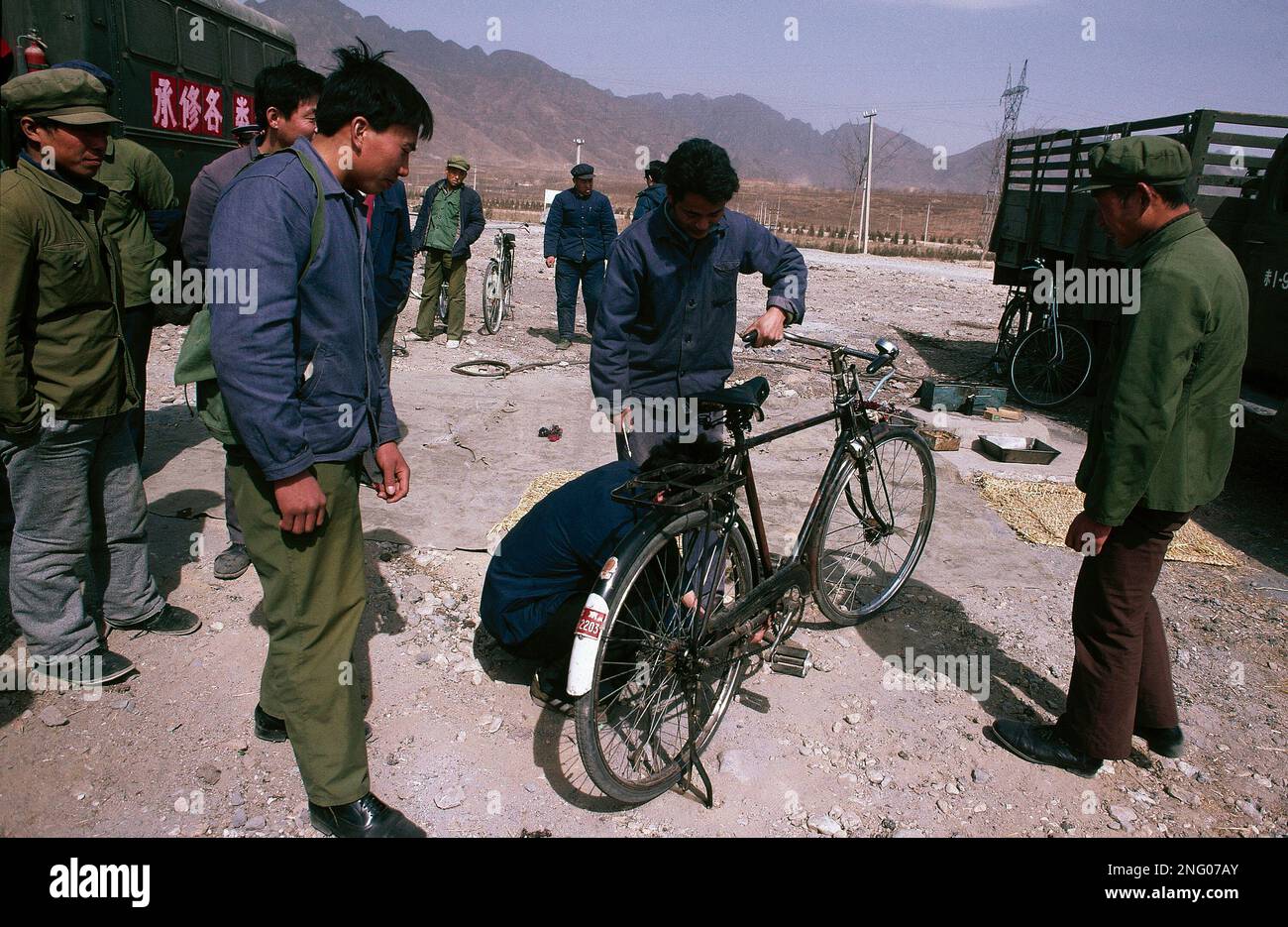 Seen here are unidentified men in Beijing, China in 1984. (AP Photo ...
