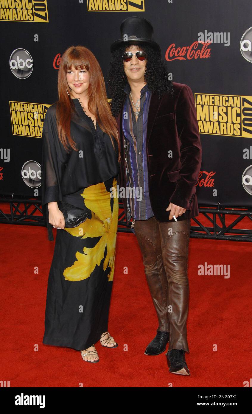 Musician Slash and wife Perla Ferrar arrive at the American Music ...