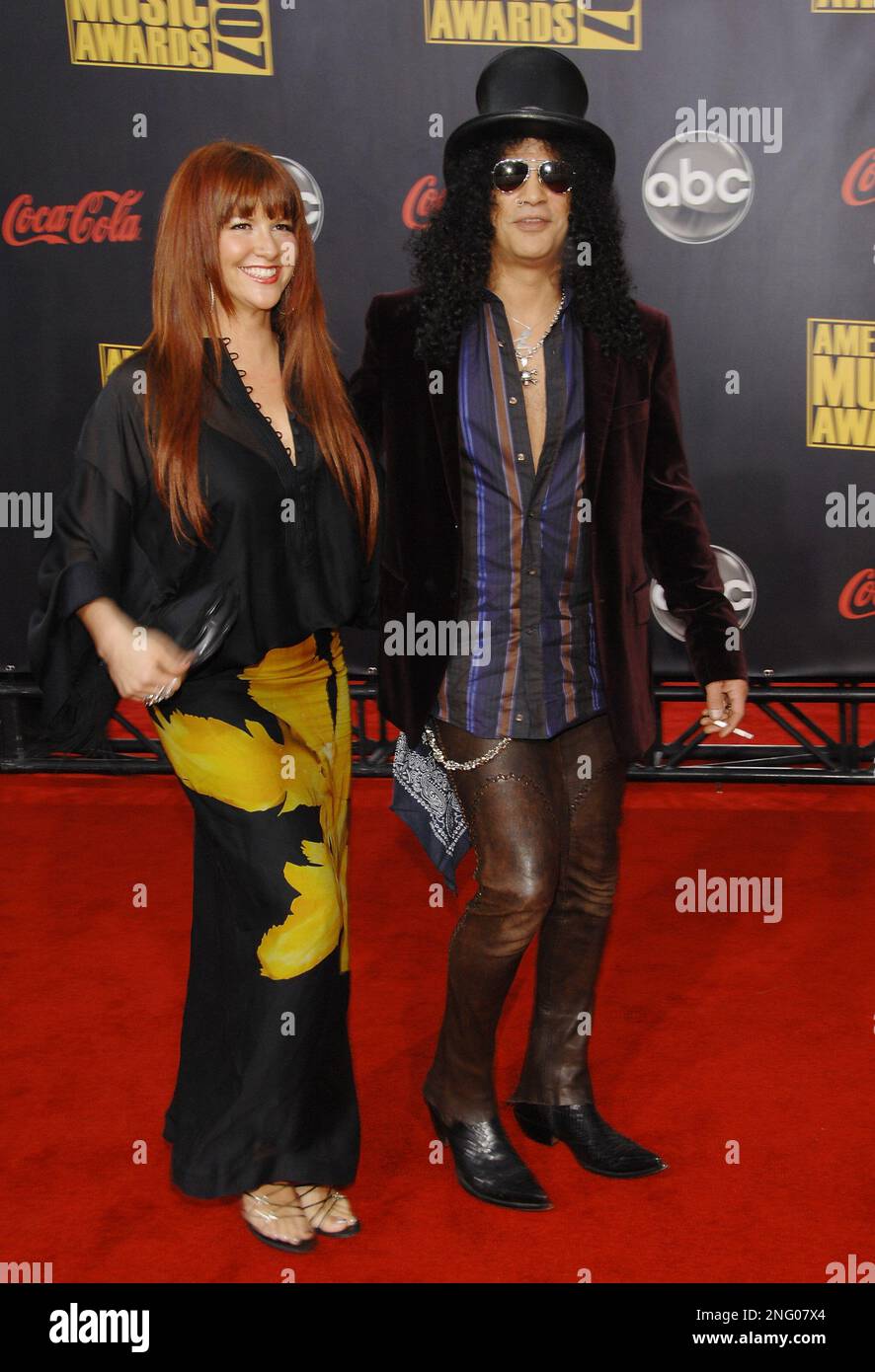 Musician Slash and wife Perla Ferrar arrive at the American Music ...