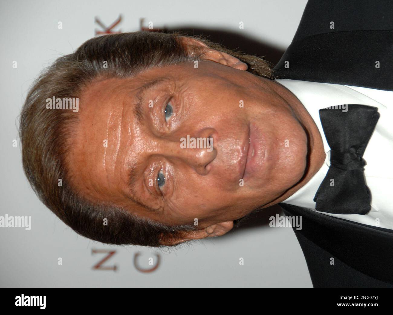 Designer Valentino arrives at the opening night gala of the New York ...