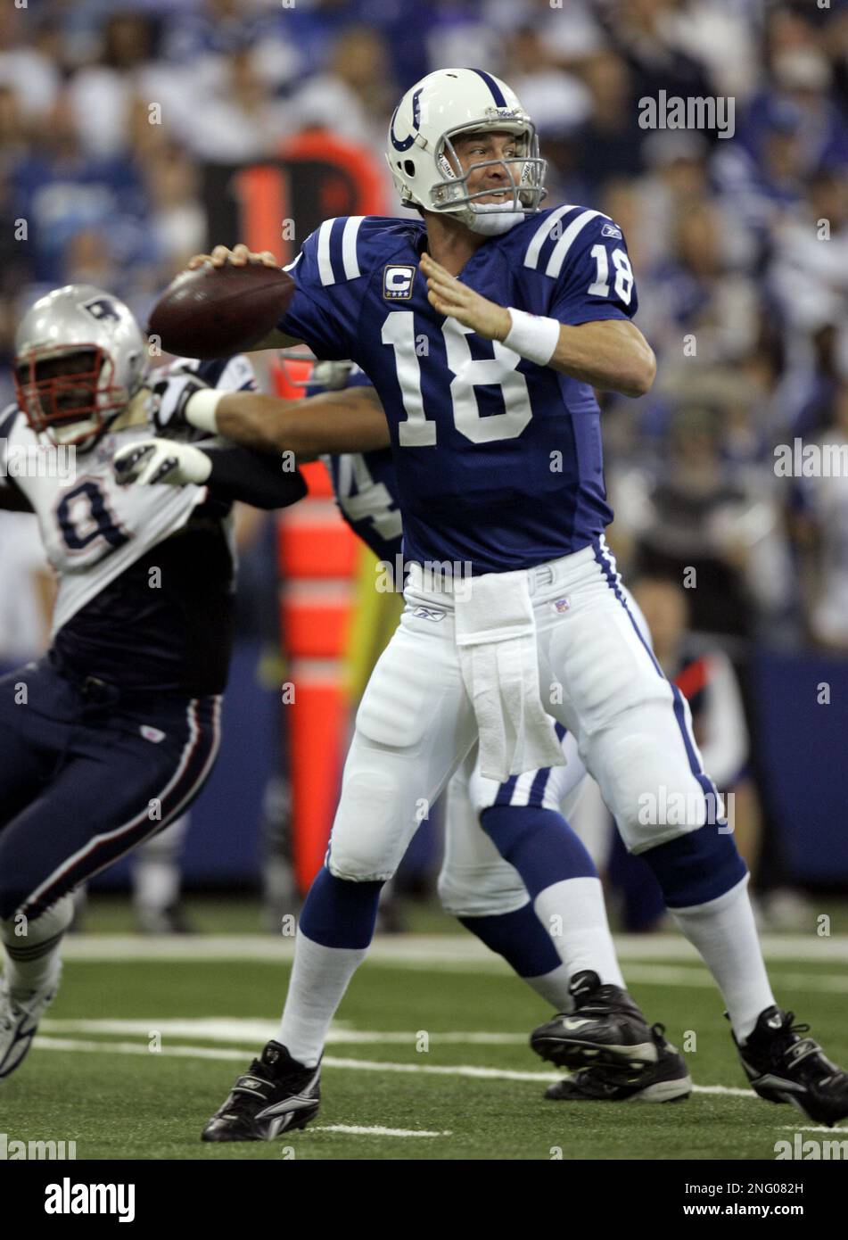 Indianapolis Colts quarterback Peyton Manning (18) falls back for a ...