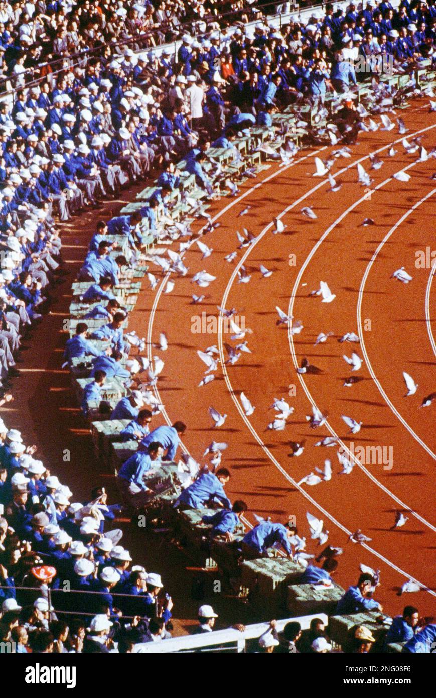 Pictured here is the release of doves at the Tokyo Stadium during the ...
