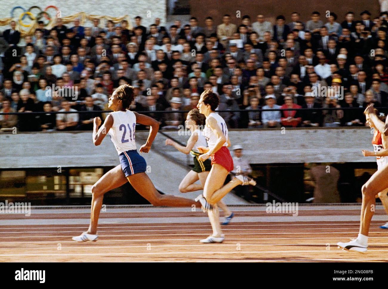 Pictured here Edith McGuire, left, wins the 200 meter dash for women at ...