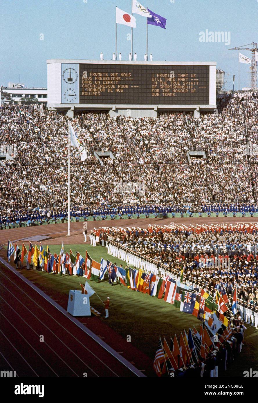 Pictured here is Tokyo Stadium at the opening ceremonies of the 1964 Summer Olympics in Tokyo ...