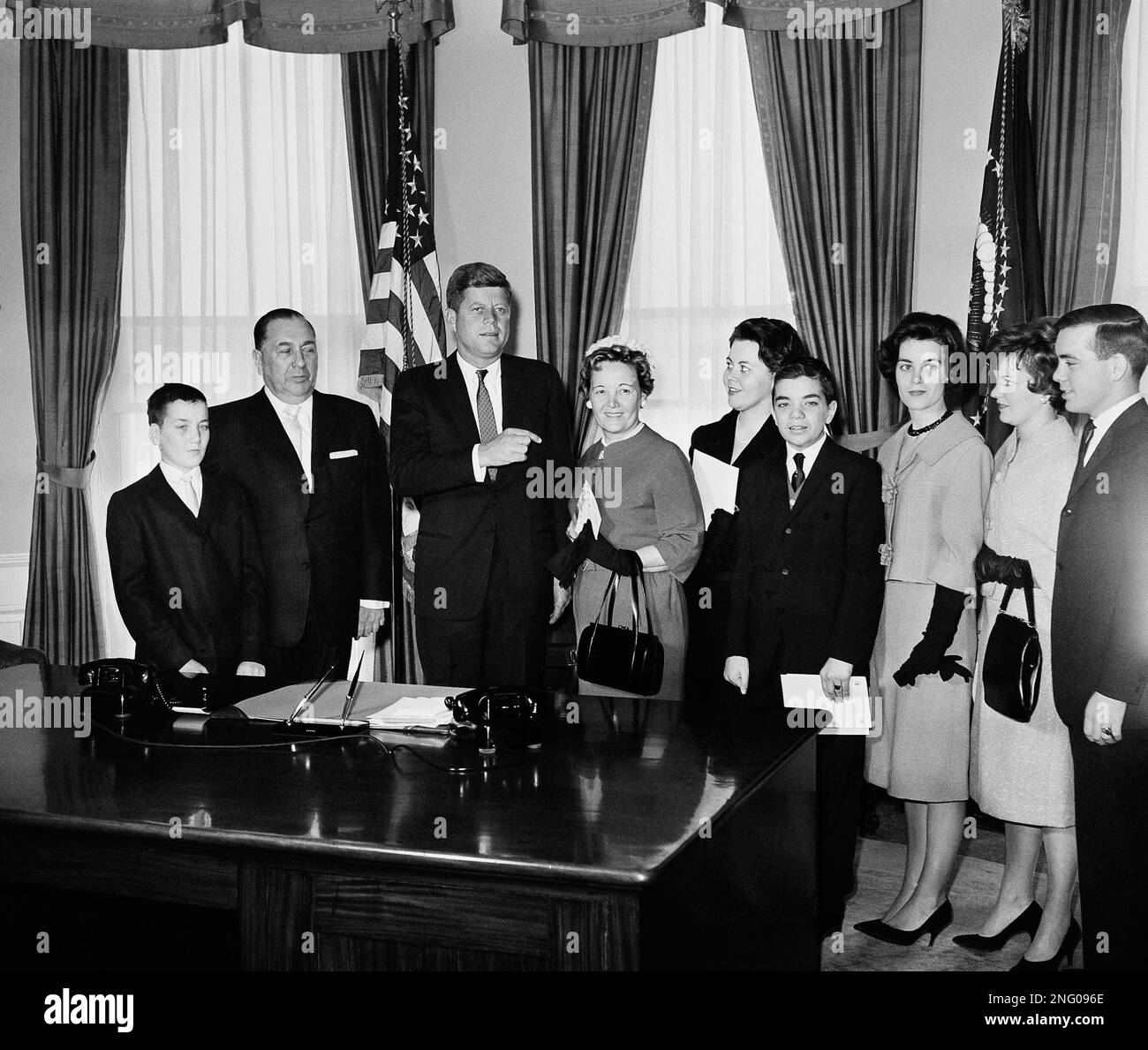 President John F. Kennedy poses in his White House office, January 21 ...