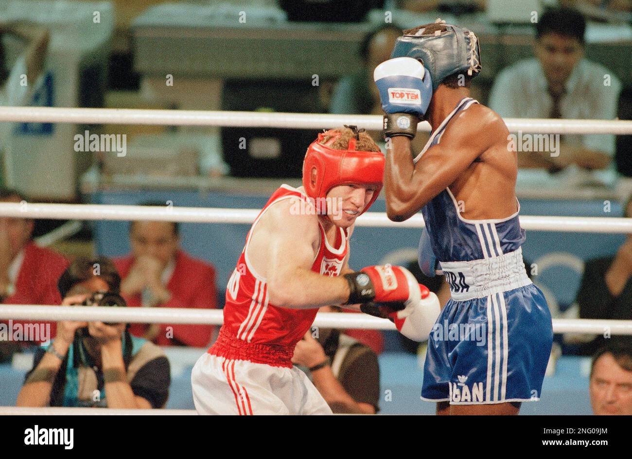 Ireland's Michael Carruth, left, fights Cuba's Juan Hernandez during ...