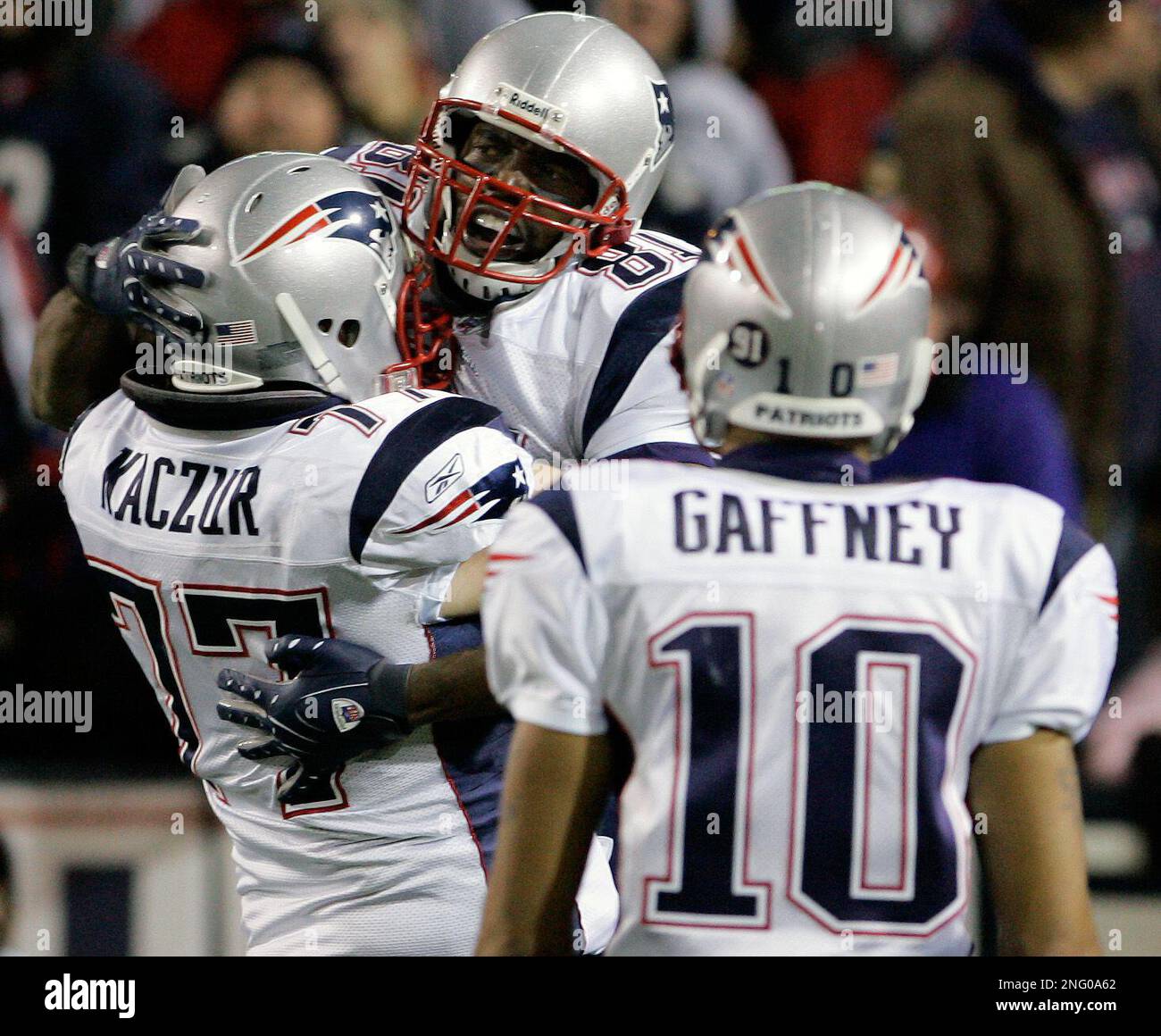 New England Patriots' Randy Moss (81) celebrates his touchdown during ...