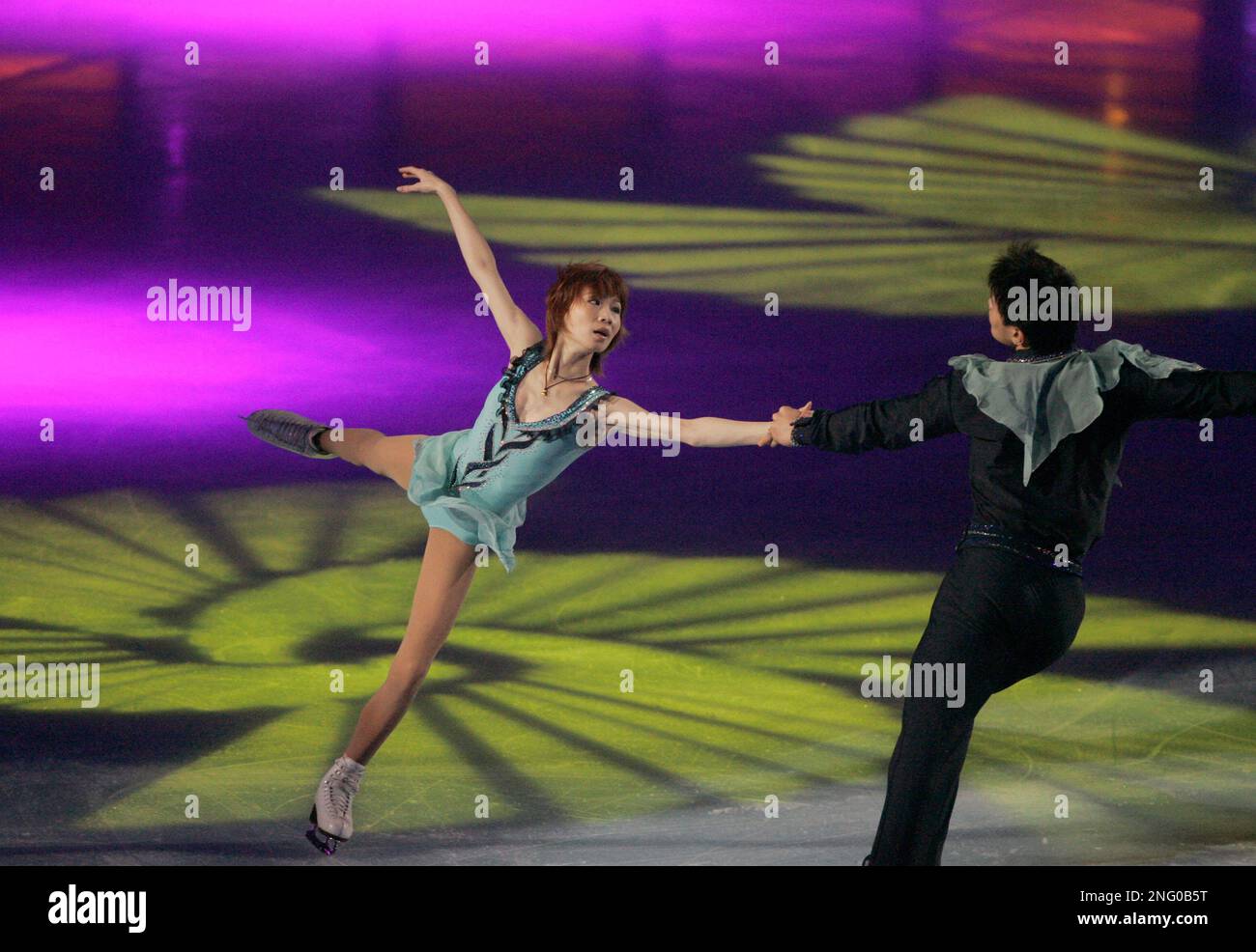 China's Zhang Dan, left, and Zhang Hao perform a skating exhibition ...