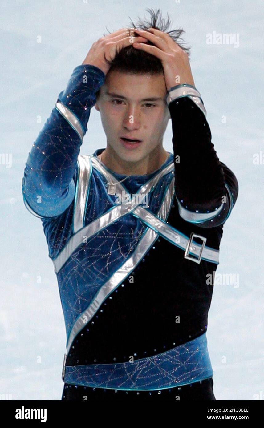 Canada's Patrick Chan reacts after his Men free skating program during ...