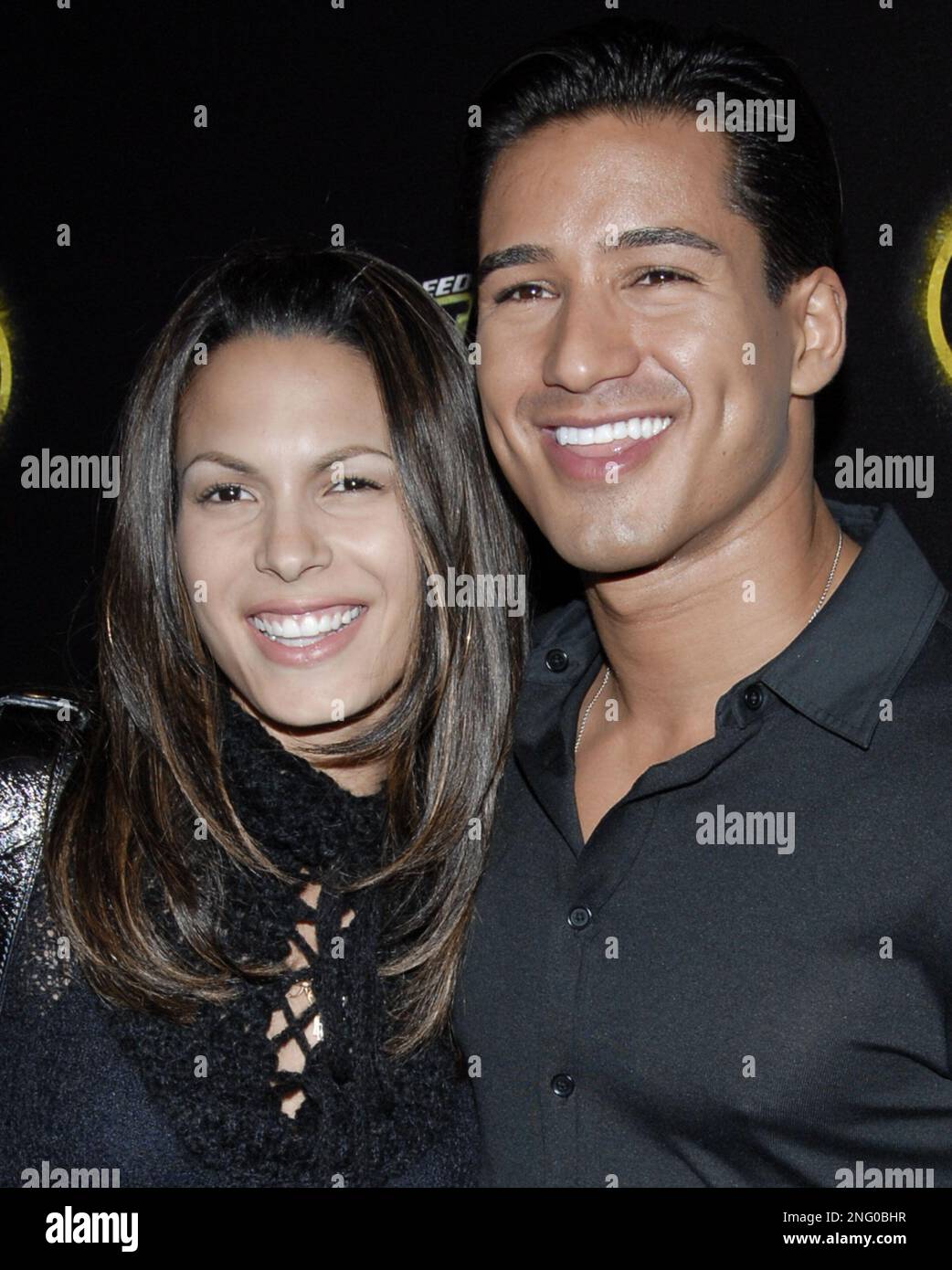 Nadine Velazquez, left, and actor Mario Lopez arrive at the game launch ...