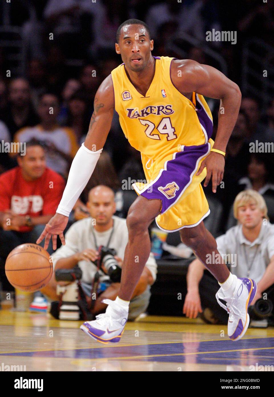 Los Angeles Lakers guard Kobe Bryant dribbles down courts during the ...